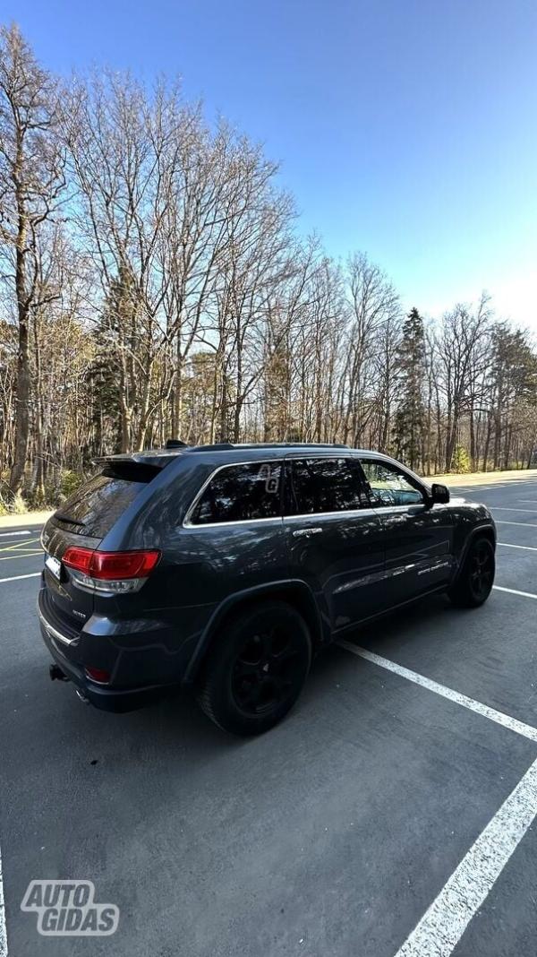 Brown Jeep Grand Cherokee 2015 in Klaipeda, with an engine capacity of 3.60 L and mileage of 189 thousand km for 14500 €, photo 4 on AUTOMOTO.COM.LV
