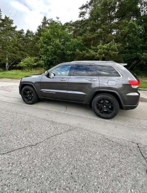 Brown Jeep Grand Cherokee 2015 in Klaipeda, with an engine capacity of 3.60 L and mileage of 189 thousand km for 13800 €, photo 9 on AUTOMOTO.COM.LV