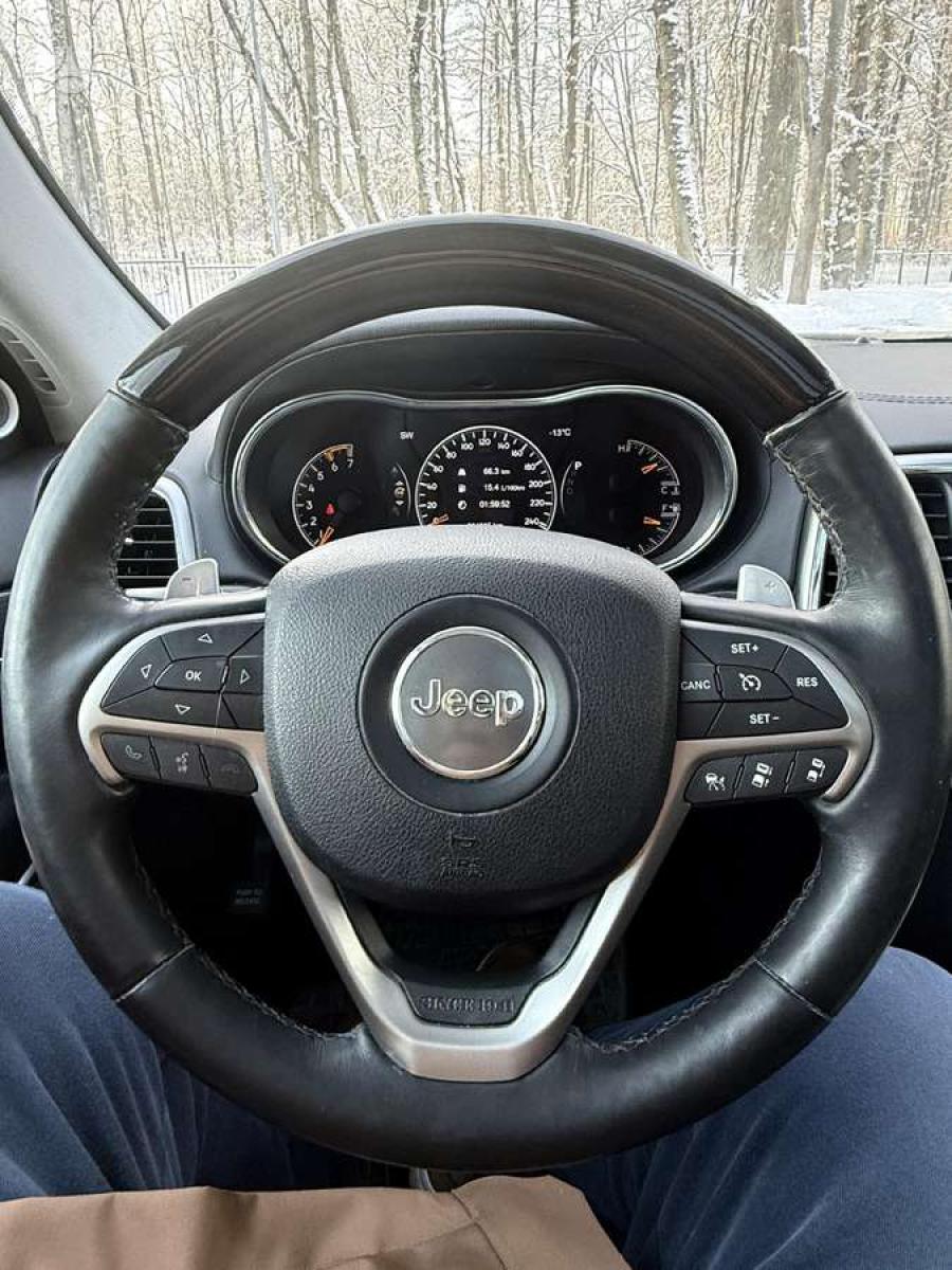 Brown Jeep Grand Cherokee 2017 in Vilnius, with an engine capacity of 5.65 L and mileage of 205 thousand km for 19900 €, photo 24 on AUTOMOTO.COM.LV