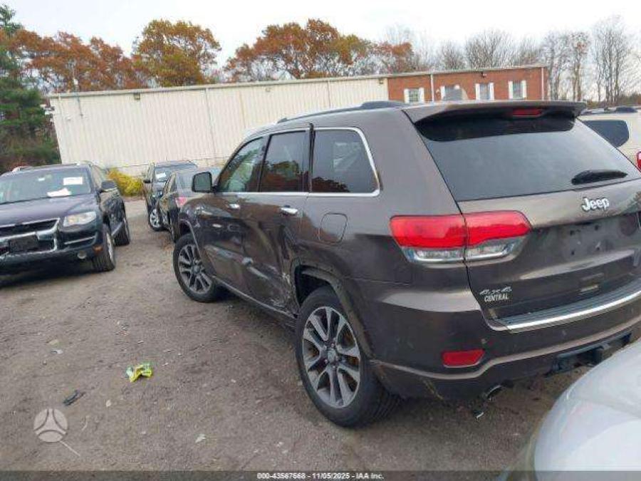 Brown Jeep Grand Cherokee 2018 in Klaipeda, with an engine capacity of 3.60 L and mileage of 200 thousand km for 7600 €, photo 1 on AUTOMOTO.COM.LV