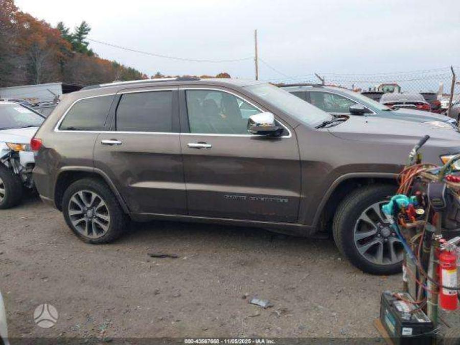 Brown Jeep Grand Cherokee 2018 in Klaipeda, with an engine capacity of 3.60 L and mileage of 200 thousand km for 7600 €, photo 10 on AUTOMOTO.COM.LV