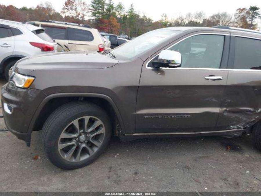 Brown Jeep Grand Cherokee 2018 in Klaipeda, with an engine capacity of 3.60 L and mileage of 200 thousand km for 7600 €, photo 11 on AUTOMOTO.COM.LV