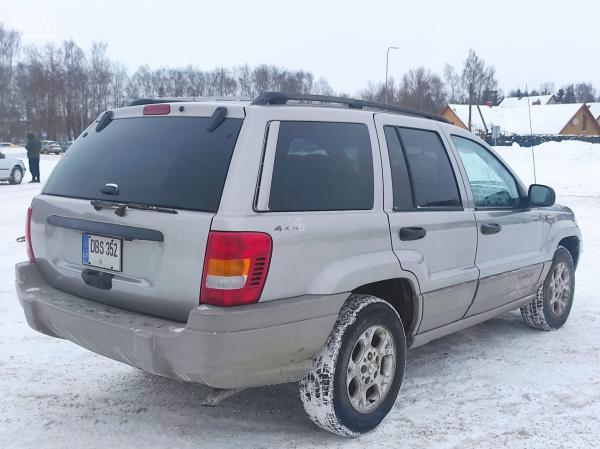 Jeep Grand Cherokee 2000 Raseiniai, ar dzinēja tilpumu 4.00 L un nobraukumu 300 tūkst. km par 3350 €, foto 4 vietnē AUTOMOTO.COM.LV