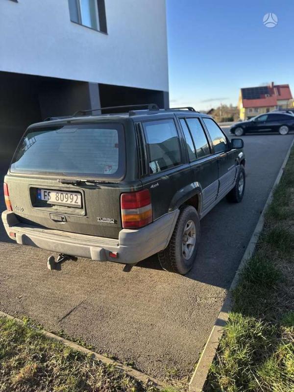 Green Jeep Grand Cherokee 1996 in Kaunas, with an engine capacity of 2.50 L and mileage of 335 thousand km for 2400 €, photo 4 on AUTOMOTO.COM.LV