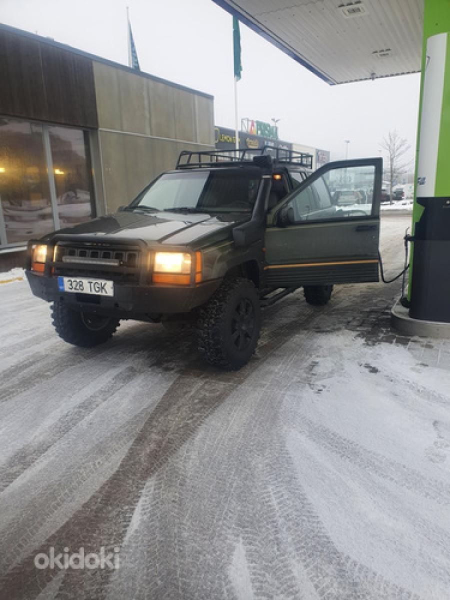 Зеленый Джип Гранд Чероки 1996 в Кохтла-Ярве, объемом двигателя 5.20 л и пробегом 0 тыс. км за 5000 €, фото 1 на AUTOMOTO.COM.LV