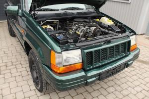 Green Jeep Grand Cherokee 1998 in Riga, with an engine capacity of 5.90 L and mileage of 0 thousand km for 12500 €, photo 35 on AUTOMOTO.COM.LV