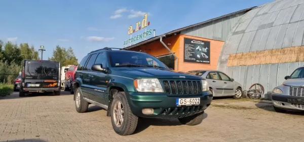 Green Jeep Grand Cherokee 1999 in Valmiera, with an engine capacity of 3.10 L and mileage of 336 thousand km for 3200 €, photo 1 on AUTOMOTO.COM.LV