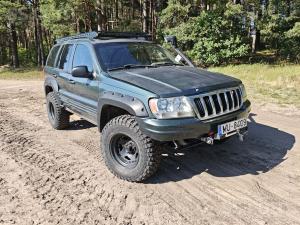 Green Jeep Grand Cherokee 1999 in Riga, with an engine capacity of 4.00 L and mileage of 310 thousand km for 3000 €, photo  on AUTOMOTO.COM.LV