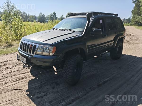 Green Jeep Grand Cherokee 1999 in Riga, with an engine capacity of 4.00 L and mileage of 310 thousand km for 3000 €, photo 2 on AUTOMOTO.COM.LV