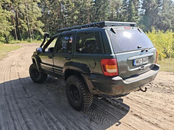 Green Jeep Grand Cherokee 1999 in Riga, with an engine capacity of 4.00 L and mileage of 310 thousand km for 3000 €, photo 4 on AUTOMOTO.COM.LV