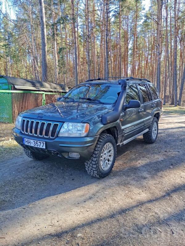 Zaļš Jeep Grand Cherokee 2002 Rīga, ar dzinēja tilpumu 4.70 L un nobraukumu 209 tūkst. km par 3700 €, foto 1 vietnē AUTOMOTO.COM.LV