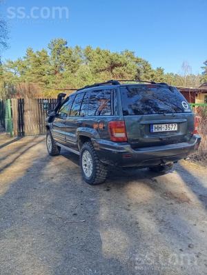 Zaļš Jeep Grand Cherokee 2002 Rīga, ar dzinēja tilpumu 4.70 L un nobraukumu 209 tūkst. km par 3700 €, foto 3 vietnē AUTOMOTO.COM.LV