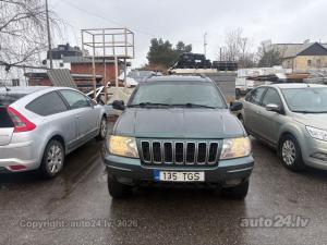 Green Jeep Grand Cherokee 2003 in Rapla, with an engine capacity of 2.70 L and mileage of 0 thousand km for 1200 €, photo 3 on AUTOMOTO.COM.LV