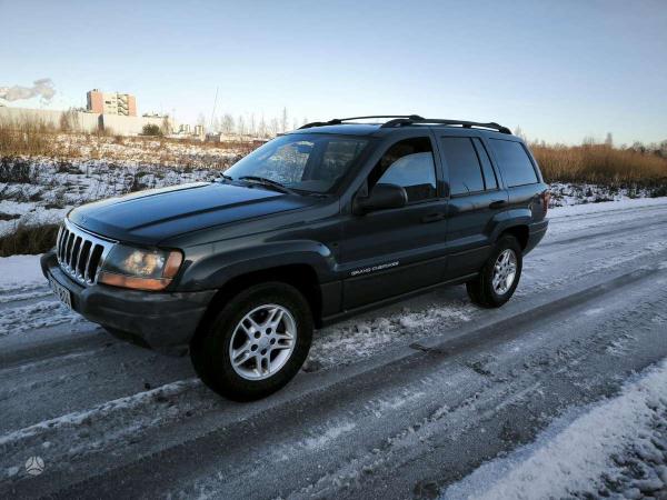 Green Jeep Grand Cherokee 2004 in Telschi, with an engine capacity of 4.00 L and mileage of 240 thousand km for 1200 €, photo 2 on AUTOMOTO.COM.LV