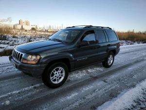 Green Jeep Grand Cherokee 2004 in Telschi, with an engine capacity of 4.00 L and mileage of 240 thousand km for 1200 €, photo 2 on AUTOMOTO.COM.LV