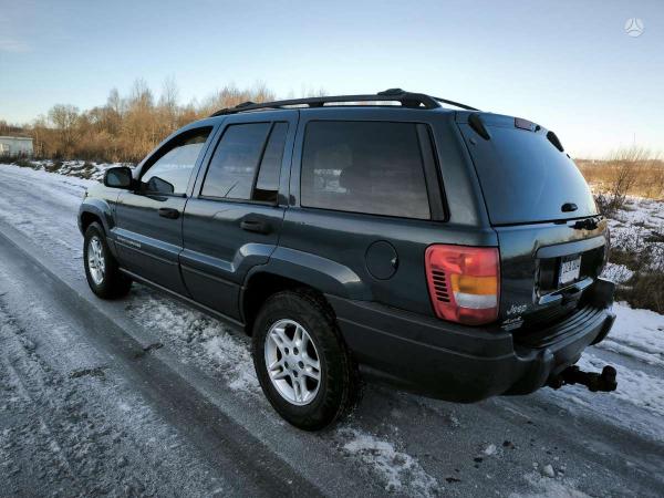 Green Jeep Grand Cherokee 2004 in Telschi, with an engine capacity of 4.00 L and mileage of 240 thousand km for 1200 €, photo 3 on AUTOMOTO.COM.LV