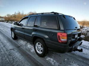 Green Jeep Grand Cherokee 2004 in Telschi, with an engine capacity of 4.00 L and mileage of 240 thousand km for 1200 €, photo 3 on AUTOMOTO.COM.LV