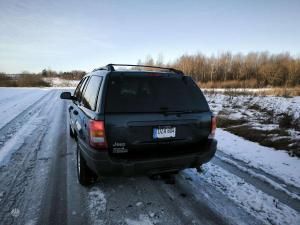 Green Jeep Grand Cherokee 2004 in Telschi, with an engine capacity of 4.00 L and mileage of 240 thousand km for 1200 €, photo 4 on AUTOMOTO.COM.LV