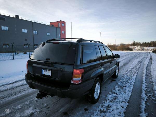 Green Jeep Grand Cherokee 2004 in Telschi, with an engine capacity of 4.00 L and mileage of 240 thousand km for 1200 €, photo 5 on AUTOMOTO.COM.LV