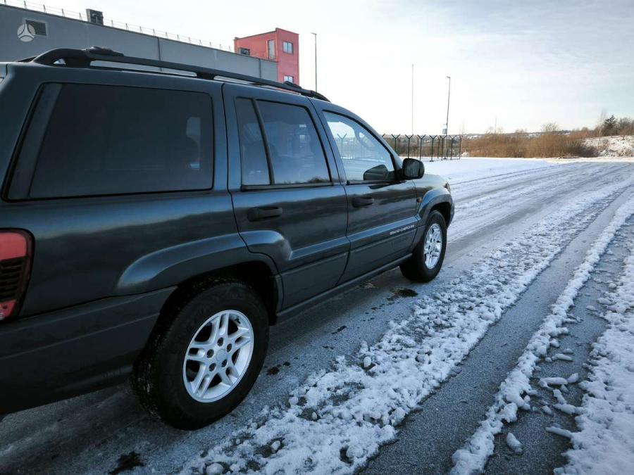 Green Jeep Grand Cherokee 2004 in Telschi, with an engine capacity of 4.00 L and mileage of 240 thousand km for 1200 €, photo 6 on AUTOMOTO.COM.LV