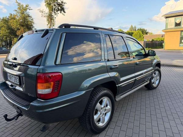 Zaļš Jeep Grand Cherokee 2005 Utena, ar dzinēja tilpumu 2.69 L un nobraukumu 236 tūkst. km par 6450 €, foto 2 vietnē AUTOMOTO.COM.LV