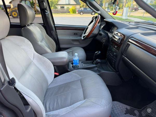 Zaļš Jeep Grand Cherokee 2005 Utena, ar dzinēja tilpumu 2.69 L un nobraukumu 236 tūkst. km par 6450 €, foto 8 vietnē AUTOMOTO.COM.LV