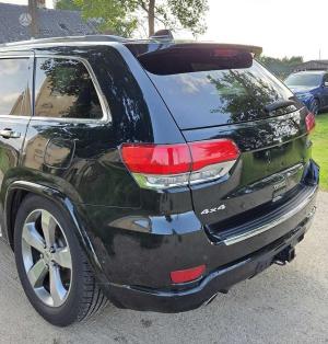 Green Jeep Grand Cherokee 2014 in Elektrenai, with an engine capacity of 3.60 L and mileage of 126 thousand km for 8800 €, photo 10 on AUTOMOTO.COM.LV