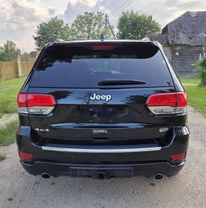 Green Jeep Grand Cherokee 2014 in Elektrenai, with an engine capacity of 3.60 L and mileage of 126 thousand km for 8800 €, photo 12 on AUTOMOTO.COM.LV