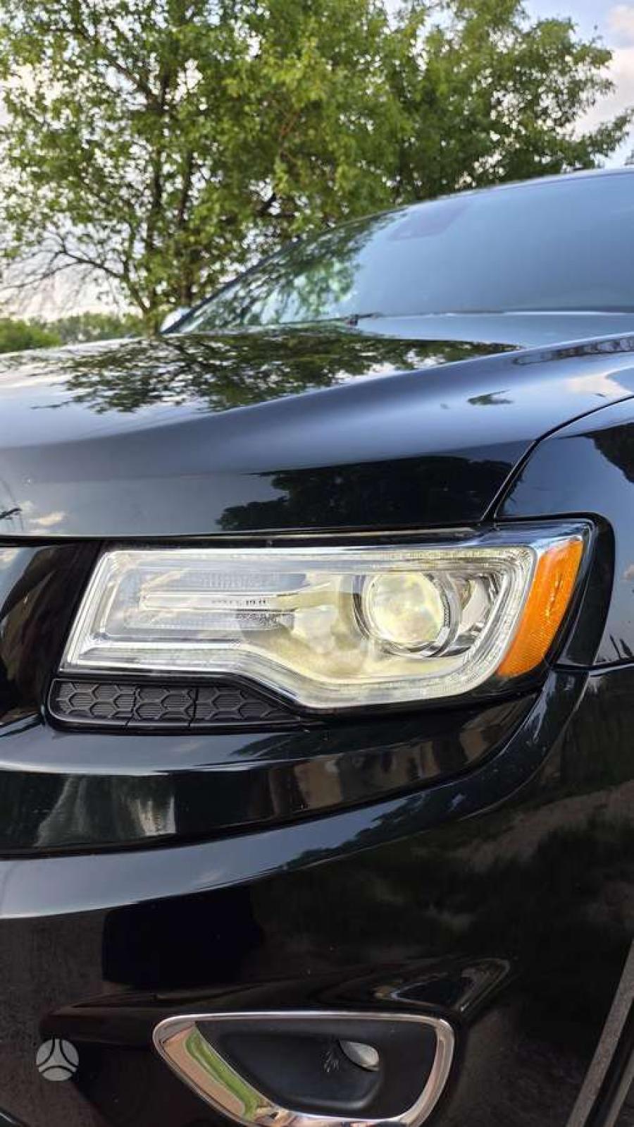 Green Jeep Grand Cherokee 2014 in Elektrenai, with an engine capacity of 3.60 L and mileage of 126 thousand km for 8800 €, photo 16 on AUTOMOTO.COM.LV