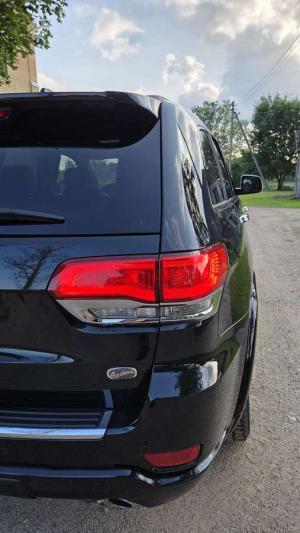 Green Jeep Grand Cherokee 2014 in Elektrenai, with an engine capacity of 3.60 L and mileage of 126 thousand km for 8800 €, photo 17 on AUTOMOTO.COM.LV