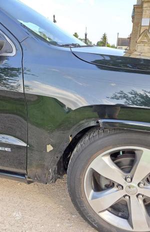 Green Jeep Grand Cherokee 2014 in Elektrenai, with an engine capacity of 3.60 L and mileage of 126 thousand km for 8800 €, photo 21 on AUTOMOTO.COM.LV