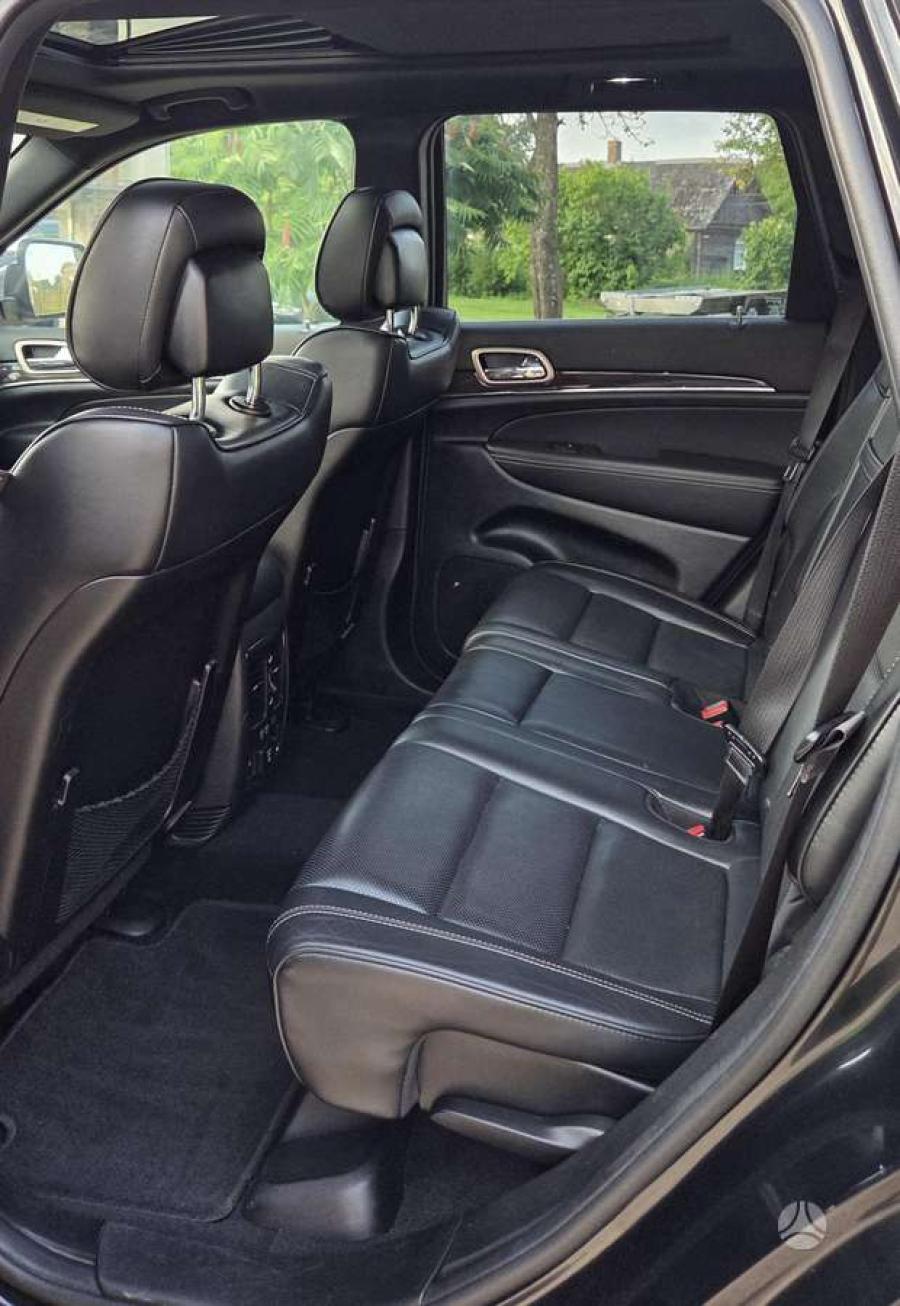 Green Jeep Grand Cherokee 2014 in Elektrenai, with an engine capacity of 3.60 L and mileage of 126 thousand km for 8800 €, photo 25 on AUTOMOTO.COM.LV