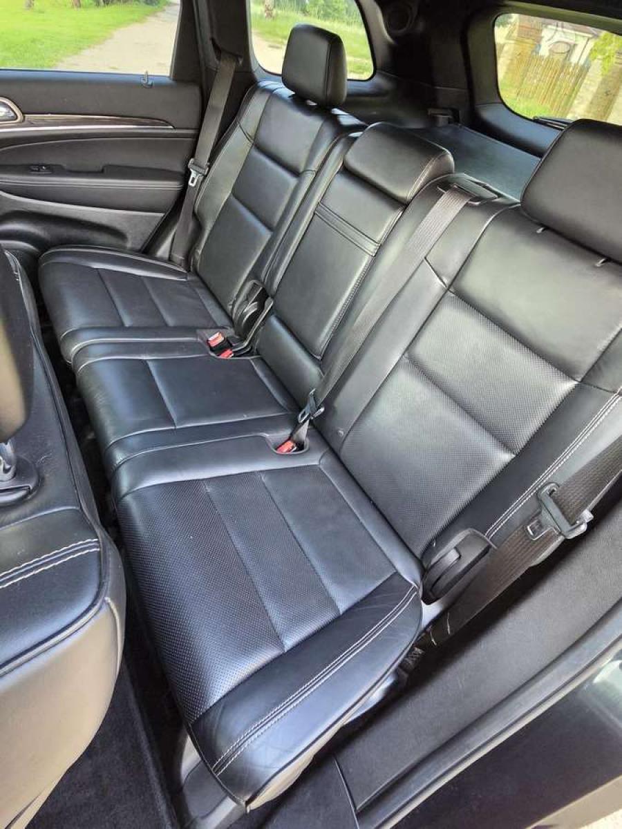 Green Jeep Grand Cherokee 2014 in Elektrenai, with an engine capacity of 3.60 L and mileage of 126 thousand km for 8800 €, photo 27 on AUTOMOTO.COM.LV