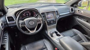 Green Jeep Grand Cherokee 2014 in Elektrenai, with an engine capacity of 3.60 L and mileage of 126 thousand km for 8800 €, photo 28 on AUTOMOTO.COM.LV