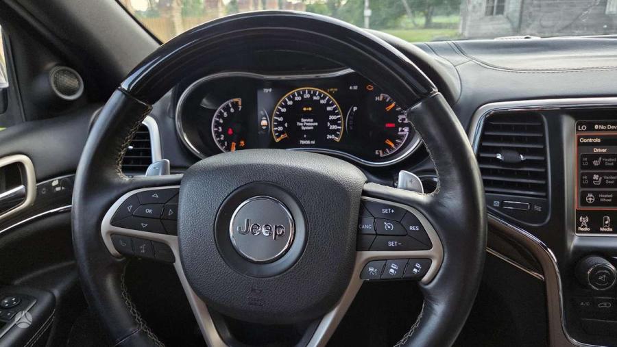 Green Jeep Grand Cherokee 2014 in Elektrenai, with an engine capacity of 3.60 L and mileage of 126 thousand km for 8800 €, photo 30 on AUTOMOTO.COM.LV