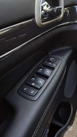 Green Jeep Grand Cherokee 2014 in Elektrenai, with an engine capacity of 3.60 L and mileage of 126 thousand km for 8800 €, photo 38 on AUTOMOTO.COM.LV