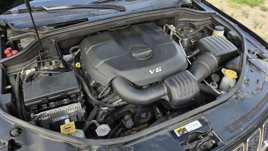 Green Jeep Grand Cherokee 2014 in Elektrenai, with an engine capacity of 3.60 L and mileage of 126 thousand km for 8800 €, photo 52 on AUTOMOTO.COM.LV