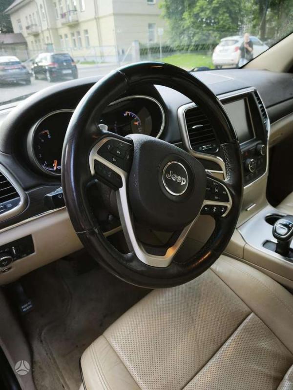 Green Jeep Grand Cherokee 2015 in Klaipeda, with an engine capacity of 2.99 L and mileage of 239 thousand km for 10500 €, photo 7 on AUTOMOTO.COM.LV