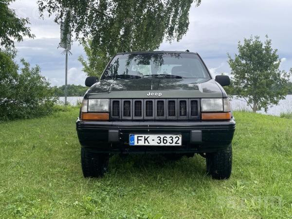 Zaļš Jeep Grand Cherokee 1995 Rīga, ar dzinēja tilpumu 4.00 L un nobraukumu 240 tūkst. km par 2700 €, foto 2 vietnē AUTOMOTO.COM.LV
