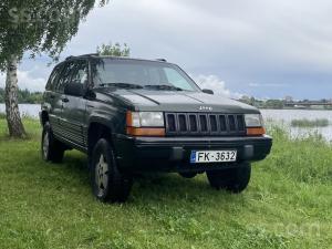 Green Jeep Grand Cherokee 1995 in Riga, with an engine capacity of 4.00 L and mileage of 240 thousand km for 2700 €, photo 4 on AUTOMOTO.COM.LV