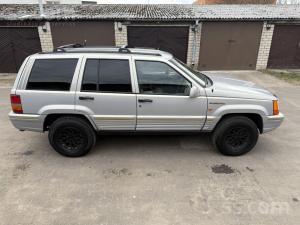 Grey Jeep Grand Cherokee 1995 in Riga, with an engine capacity of 5.20 L and mileage of 262 thousand km for 3290 €, photo 11 on AUTOMOTO.COM.LV