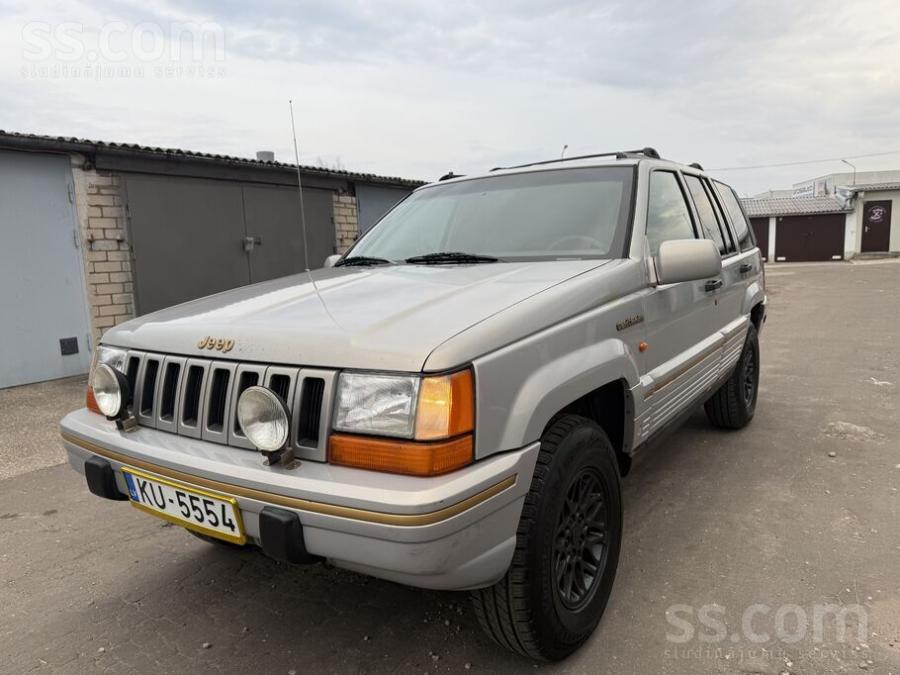 Grey Jeep Grand Cherokee 1995 in Riga, with an engine capacity of 5.20 L and mileage of 262 thousand km for 3290 €, photo 13 on AUTOMOTO.COM.LV