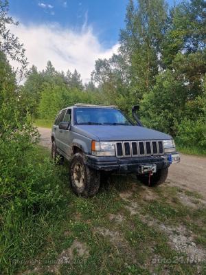 Grey Jeep Grand Cherokee 1997 in Tallinn, with an engine capacity of 5.20 L and mileage of 298 thousand km for 4999 €, photo 7 on AUTOMOTO.COM.LV