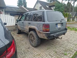 Grey Jeep Grand Cherokee 1997 in Tallinn, with an engine capacity of 5.20 L and mileage of 298 thousand km for 4999 €, photo 8 on AUTOMOTO.COM.LV