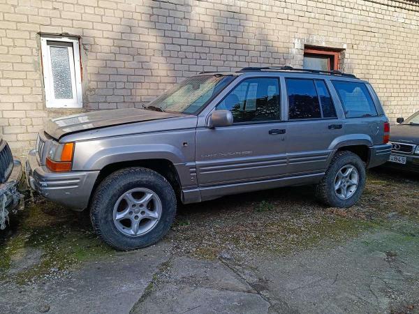 Pelēks Jeep Grand Cherokee 1998 Šakiai, ar dzinēja tilpumu 5.90 L un nobraukumu 222 tūkst. km par 3888 €, foto 1 vietnē AUTOMOTO.COM.LV