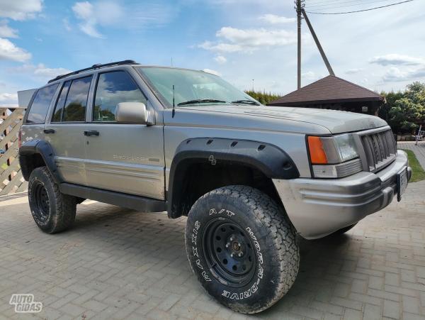 Pelēks Jeep Grand Cherokee 1998 Tauragė, ar dzinēja tilpumu 5.90 L un nobraukumu 246 tūkst. km par 2800 €, foto 2 vietnē AUTOMOTO.COM.LV