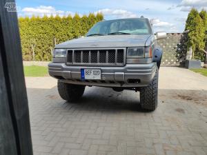 Grey Jeep Grand Cherokee 1998 in Taurage, with an engine capacity of 5.90 L and mileage of 246 thousand km for 2800 €, photo 4 on AUTOMOTO.COM.LV