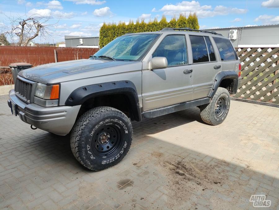 Grey Jeep Grand Cherokee 1998 in Taurage, with an engine capacity of 5.90 L and mileage of 246 thousand km for 2800 €, photo 5 on AUTOMOTO.COM.LV