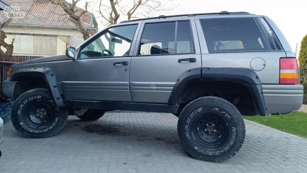 Pelēks Jeep Grand Cherokee 1998 Tauragė, ar dzinēja tilpumu 5.90 L un nobraukumu 246 tūkst. km par 2800 €, foto 5 vietnē AUTOMOTO.COM.LV