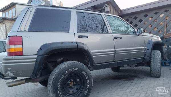 Pelēks Jeep Grand Cherokee 1998 Tauragė, ar dzinēja tilpumu 5.90 L un nobraukumu 246 tūkst. km par 2800 €, foto 6 vietnē AUTOMOTO.COM.LV